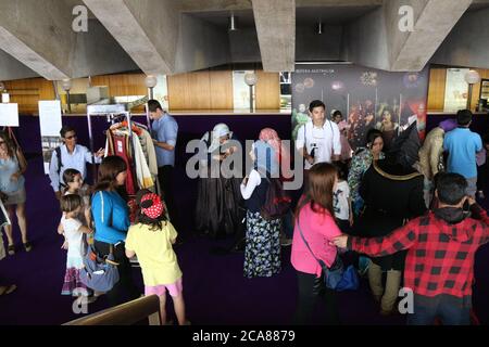 Visitors can try on a costume at the Sydney Opera House Open Day ...