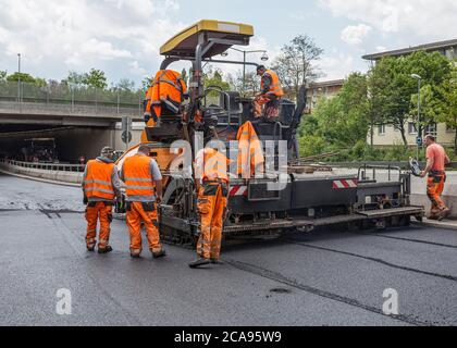 Roadworks, application of new asphalt on german highway Stock Photo - Alamy