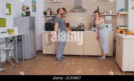 Angry man and woman fighting making gestures with palms as couple ...