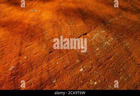 Bedrock surface colored red by Trentepohlia Iolithus algae , Finland ...