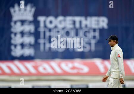 England captain Joe Root leaves the field after winning the toss and ...