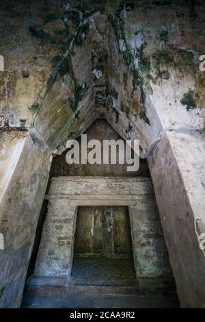 A corbel arch or corbel vault in Structure A2 in the Mayan ruins in the ...