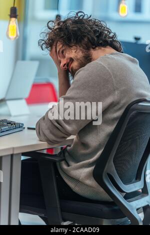 angry bearded businessman in black suit isolated on grey Stock Photo ...