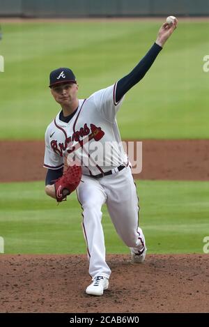 Atlanta Braves pitcher Sean Newcomb (15) takes his warm up throws ...