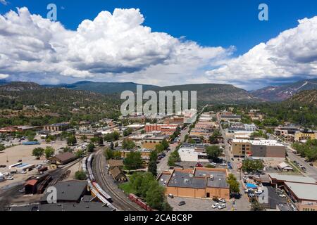 Aerial view above downtown Durango, Colorado and the San Juan Mountains ...
