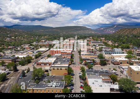Aerial view above downtown Durango, Colorado and the San Juan Mountains ...