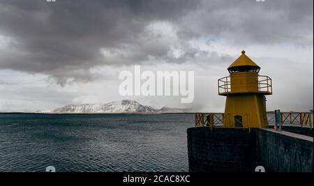 A large yellow lighthouse in Iceland, Reykjavik Stock Photo - Alamy