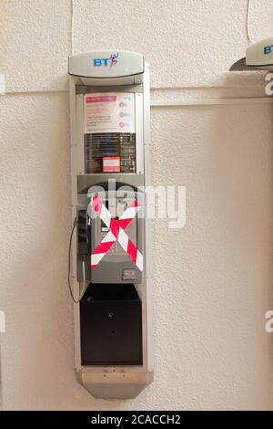 Out of order phone booth in one of many London streets Stock Photo - Alamy