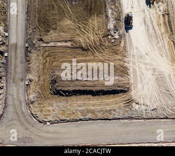 Aerial top view of unfinished subdivision incomplete neighborhoods ...