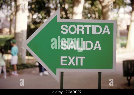 Spain: Multi-lingual public signage meaning "exit" in English, Spanish ...