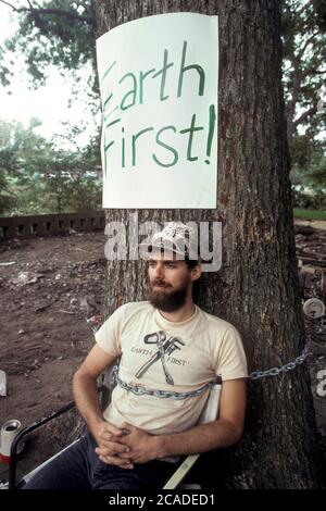 Austin Texas USA, ©1990: Earth First! activist chained to tree to ...
