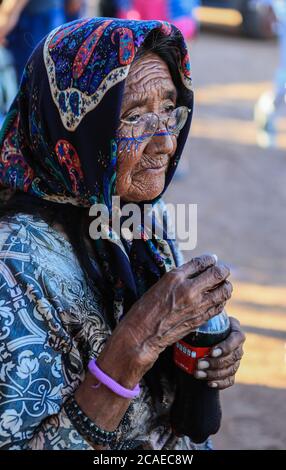 An elderly Seri woman performs traditional and ancestral songs during ...