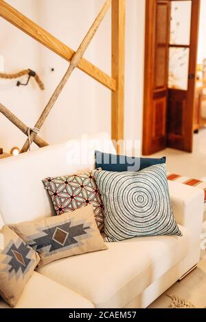 Different pillows on blue background Stock Photo - Alamy