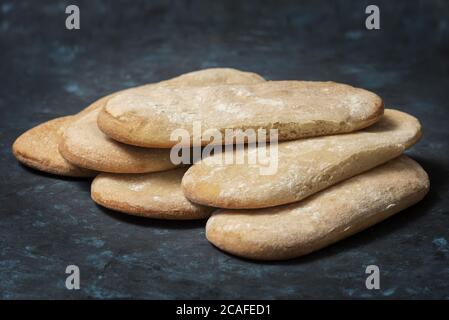 Flat lay of oval shaped cookies with knife Stock Photo - Alamy
