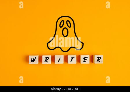 Ghostwriter concept with a ghost symbol and the word writer on wooden ...