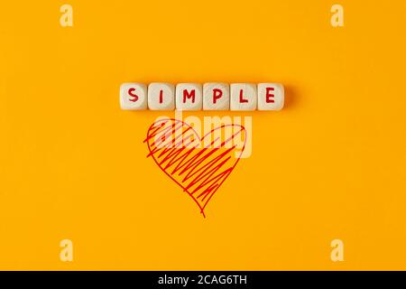 Word Love, shape heart are drawn with finger on fogged window glass ...