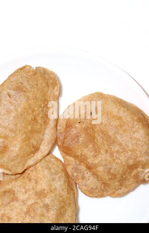 Fresh fried poori, or puri, on the streets of India; Karaikudi ...