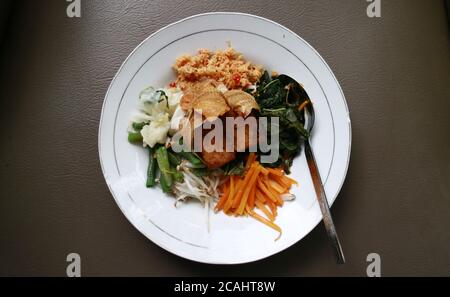 Sayur urap. Cooked vegetables with spiced grated coconut. Indonesian ...