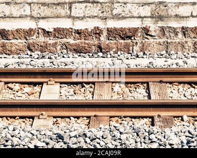 A closeup shot of rusty railroad tracks Stock Photo - Alamy
