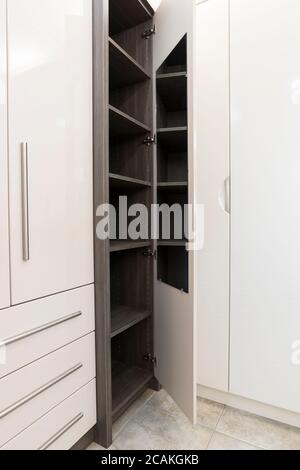 Tall modern bedroom wardrobe example Stock Photo - Alamy