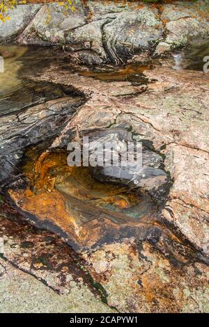 Lake Superior shoreline granite outcrops with igneous dykes at ...