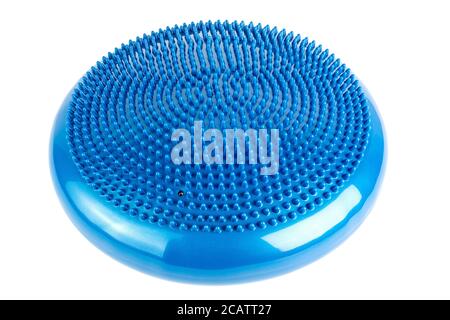 Blue inflatable balance disk isoleated on white background, It is also ...