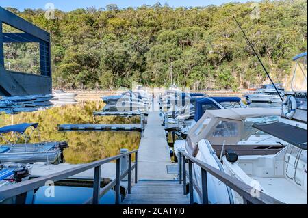 Boats and Yachts moored at D'Albora Marinas Akuna Bay on a sunny winter ...