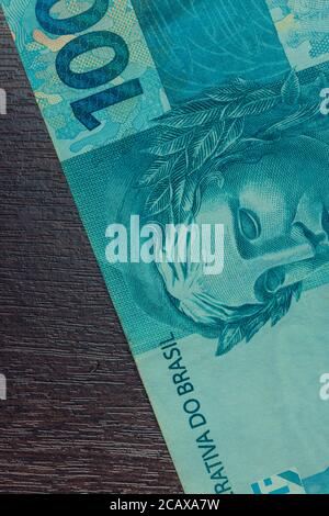 Closeup at 100 bill Brazilian money Stock Photo - Alamy