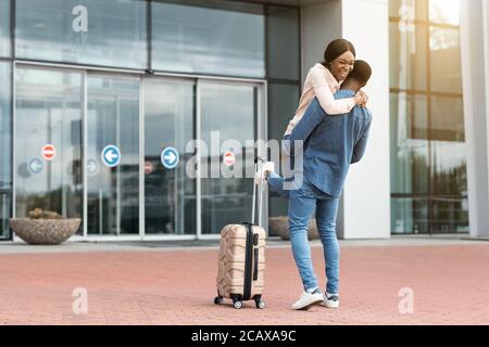 American couple hug, reunion after war and people with love and welcome ...