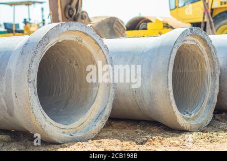 Stack of concrete drainage wells for water discharges in construction ...