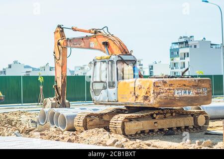 Stack of concrete drainage wells for water discharges in construction ...