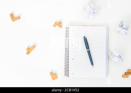 Puzzle, pencil, notebook and crumpled paper Stock Photo - Alamy