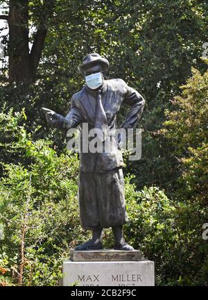 The Max Miller statue in Pavilion Gardens , Brighton , Sussex , England ...