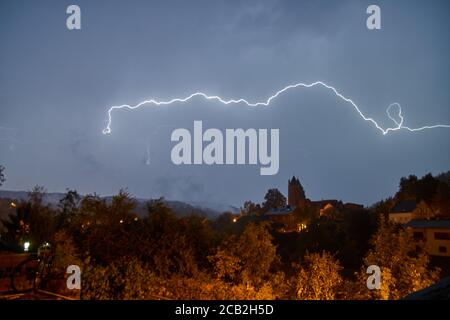 Castle photographed during a thunderstorm with lightning at night in ...