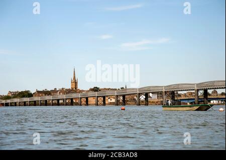 Landscape image from Montrose basin of the old red brick railway bridge ...