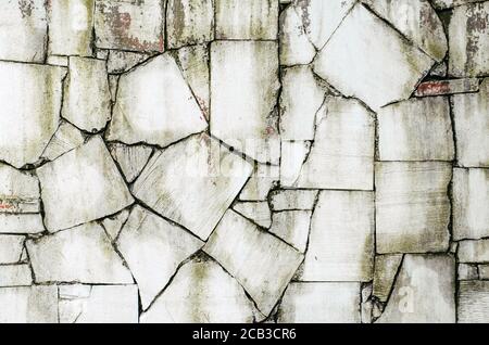 Old gray stone wall with green moss texture background Stock Photo - Alamy
