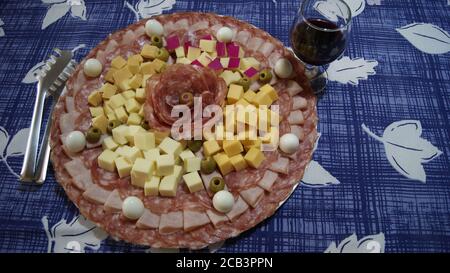 Quail eggs in a glass dish placed on a beige background. An image of ...