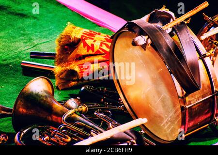 An Indian wedding band playing musical instruments in a rural wedding ...