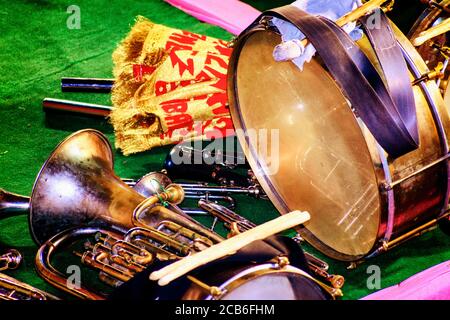 An Indian wedding band playing musical instruments in a rural wedding ...
