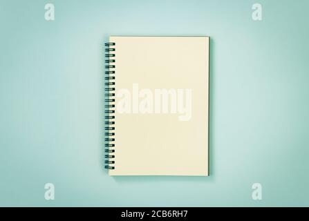 Spiral Notebook or Spring Notebook in Unlined Type and Green Pen on ...