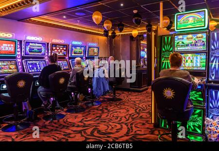 Customers using slot machines at a Cashino in Merry Hill Centre ...