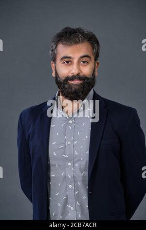 Indian novelist Prayaag Akbar attends a photocall during the annual ...