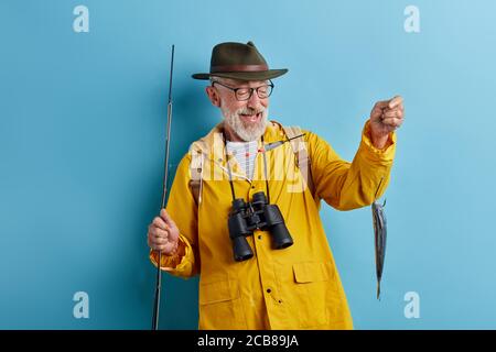 A fisher man catching a fresh fish from the ashtamudi lake Stock Photo ...