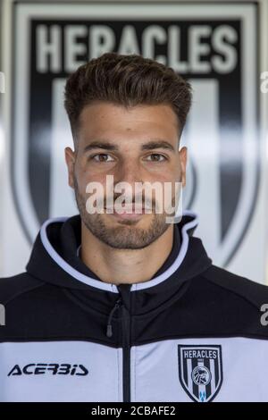 Sinan Bakis signs a contract at Heracles Almelo Stock Photo - Alamy