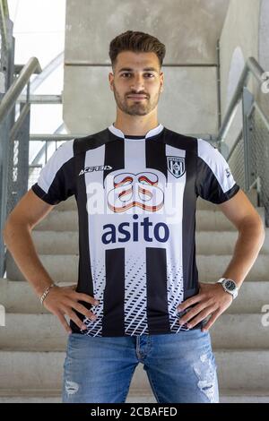 Sinan Bakis signs a contract at Heracles Almelo Stock Photo - Alamy