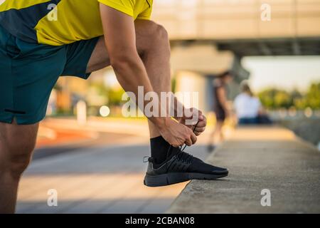 Before training. Handsome man getting ready for workout Stock Photo - Alamy