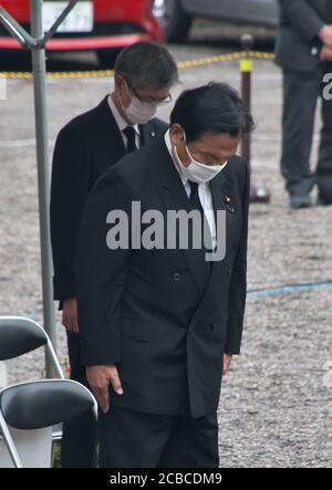 Japan Airlines (JAL) President Yuji Akasaka offers flower at Osutaka ...