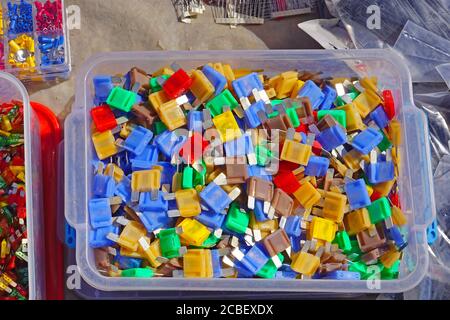 Many color coded fuses for cars in box Stock Photo - Alamy