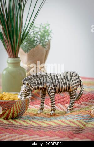 Metal food server in the shape of a zebra Stock Photo - Alamy