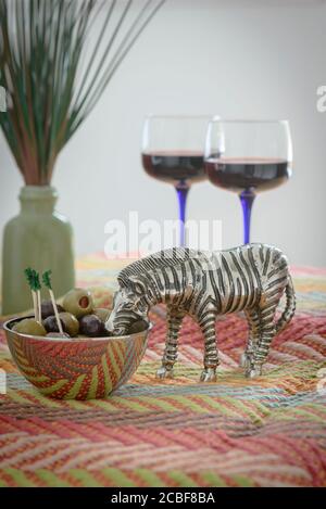 Metal food server in the shape of a zebra Stock Photo - Alamy